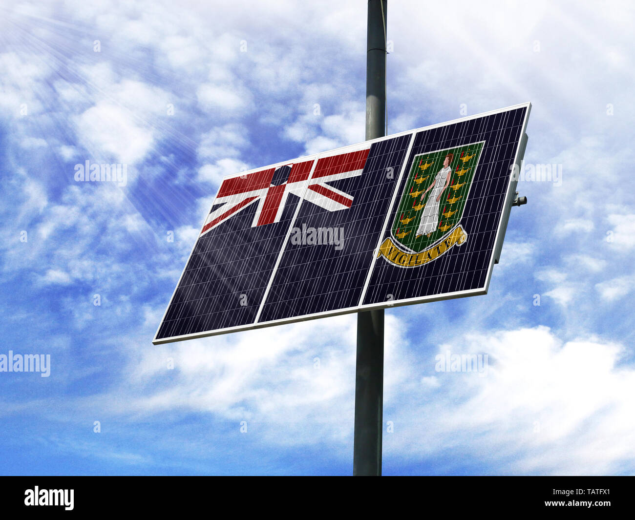 Solar panels against a blue sky with a picture of the flag of British ...