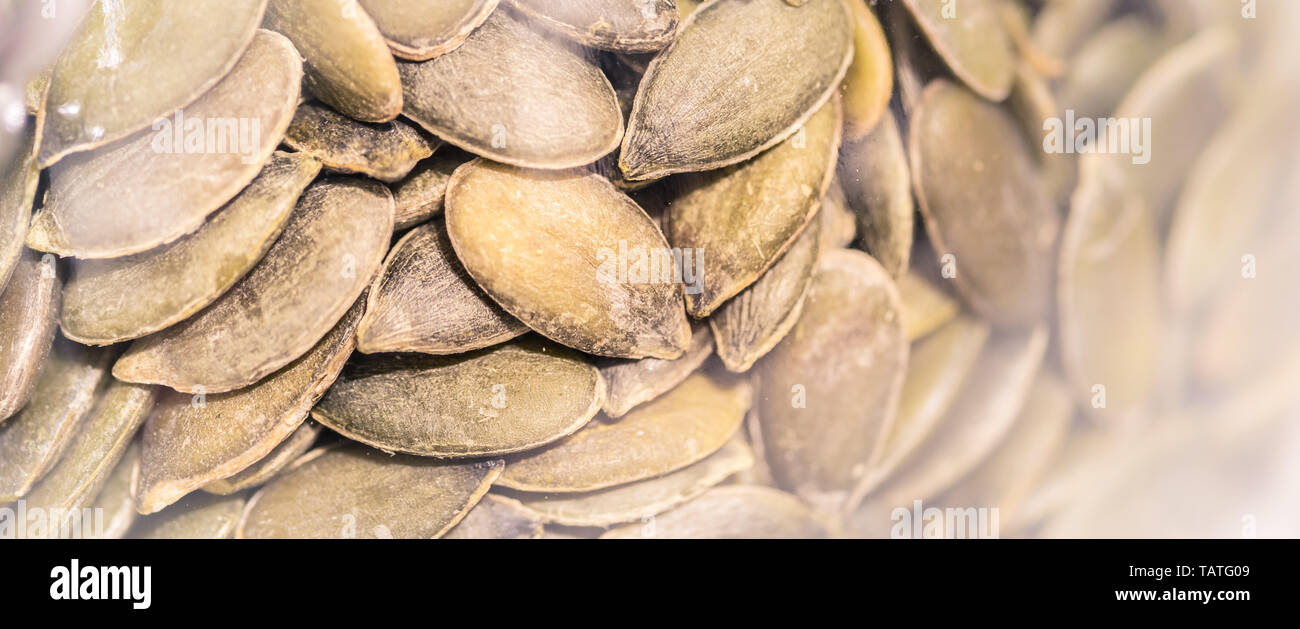 Pumpkin seeds isolated on white background Stock Photo - Alamy
