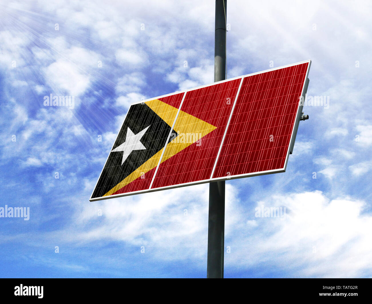 Solar panels against a blue sky with a picture of the flag of East ...