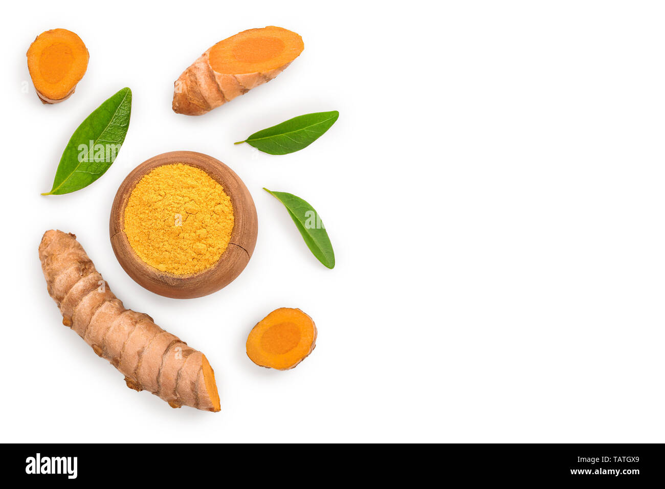 Turmeric powder and turmeric root isolated on white background with ...