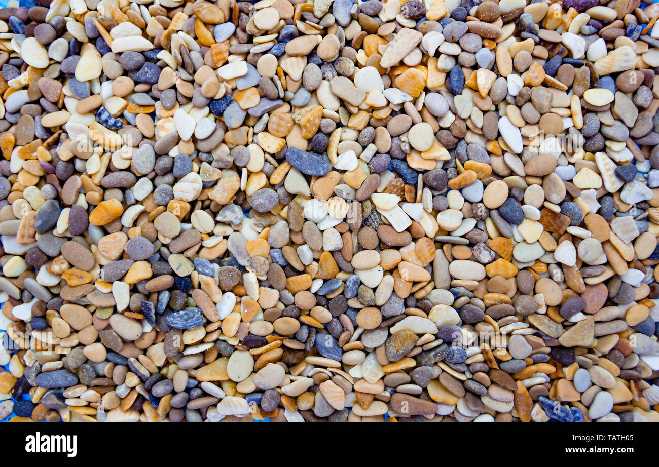 Smooth pebble background from a beach shore Stock Photo - Alamy