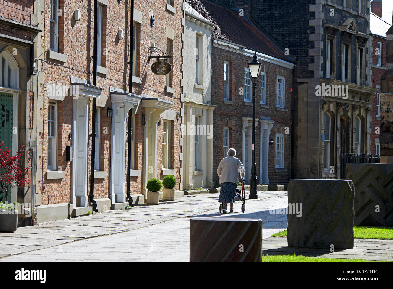 Old lady with walker, Churchside, Howden, East Yorkshire, England UK ...