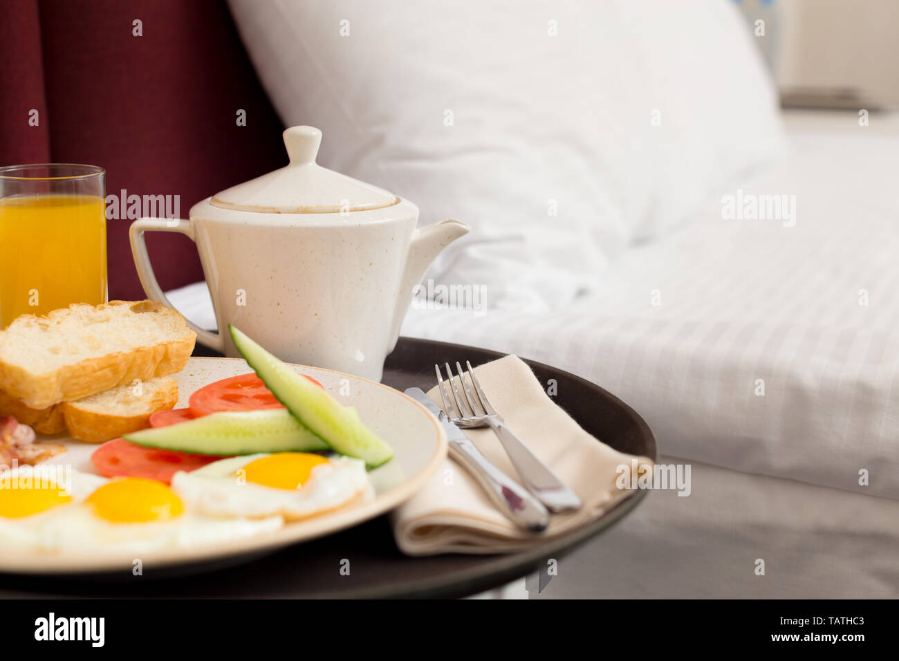 Breakfast in bed in hotel room Stock Photo - Alamy