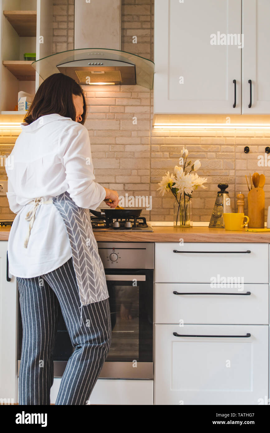 Woman oven rear hi-res stock photography and images - Alamy