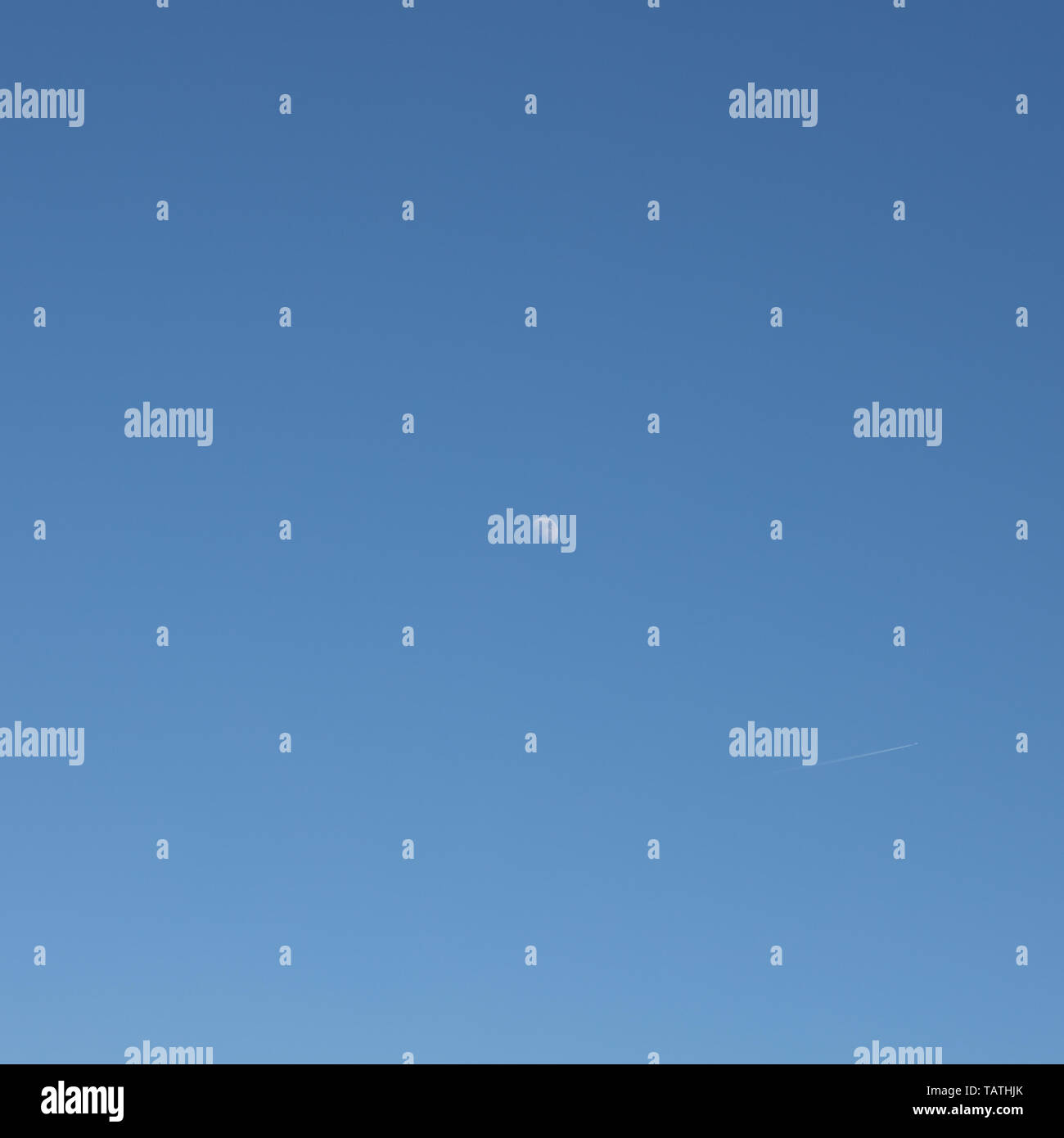 Daylight moon with aeroplane flying Stock Photo - Alamy