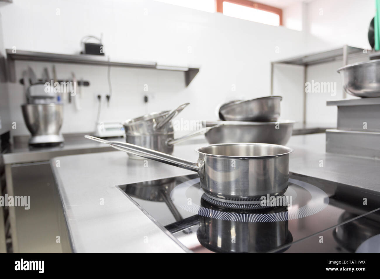 Stove counter in a modern restaurant kitchen Stock Photo - Alamy