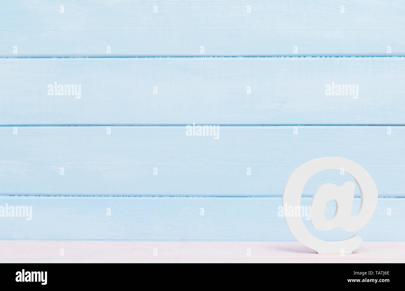 e-mail symbol on wooden background with copy space Stock Photo - Alamy