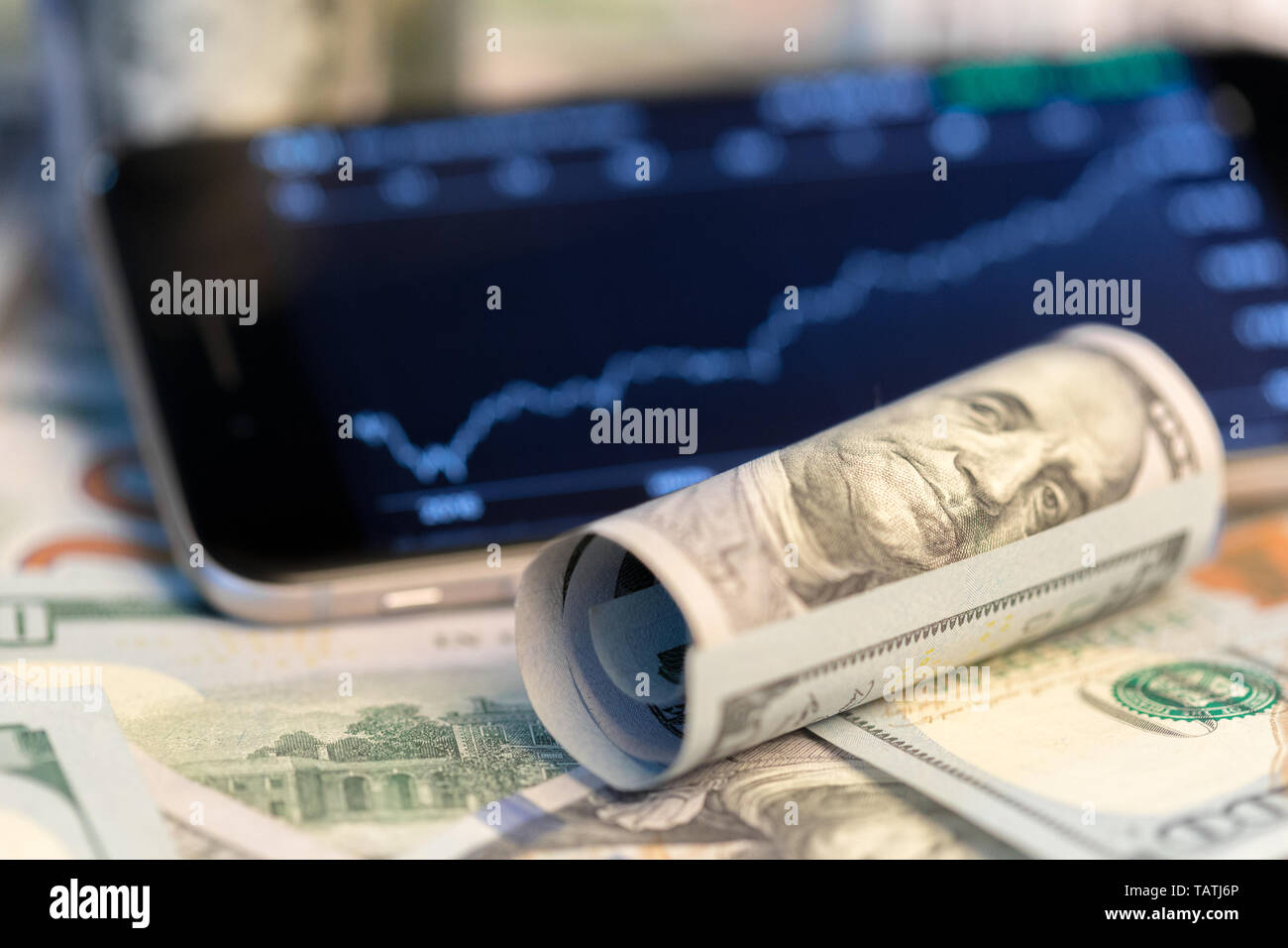 money and graph Stock Photo - Alamy