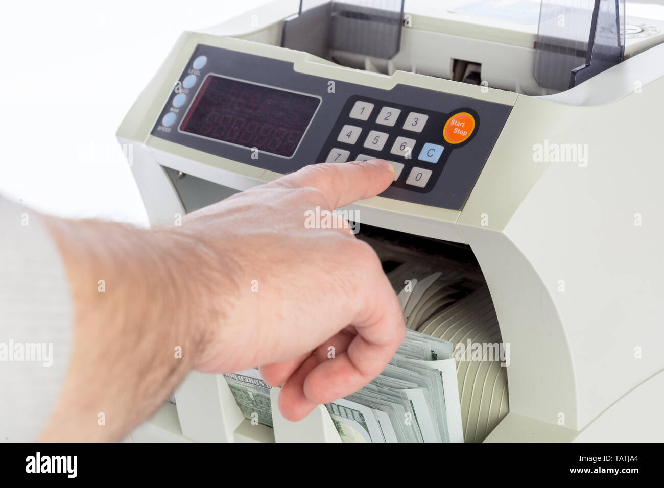 money counter isolated on white Stock Photo - Alamy
