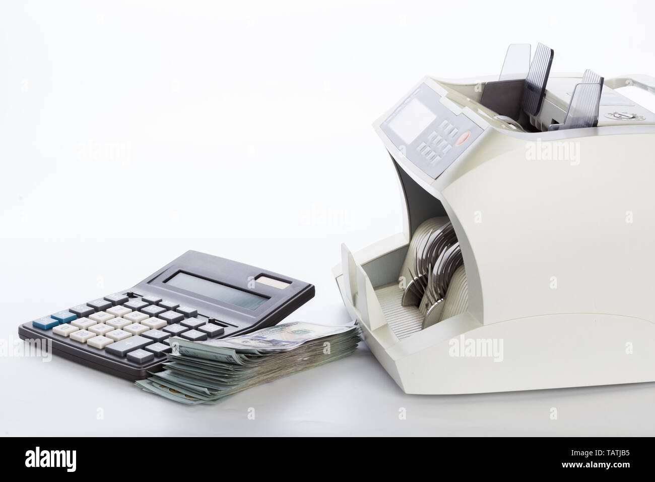 money counter isolated on white Stock Photo - Alamy