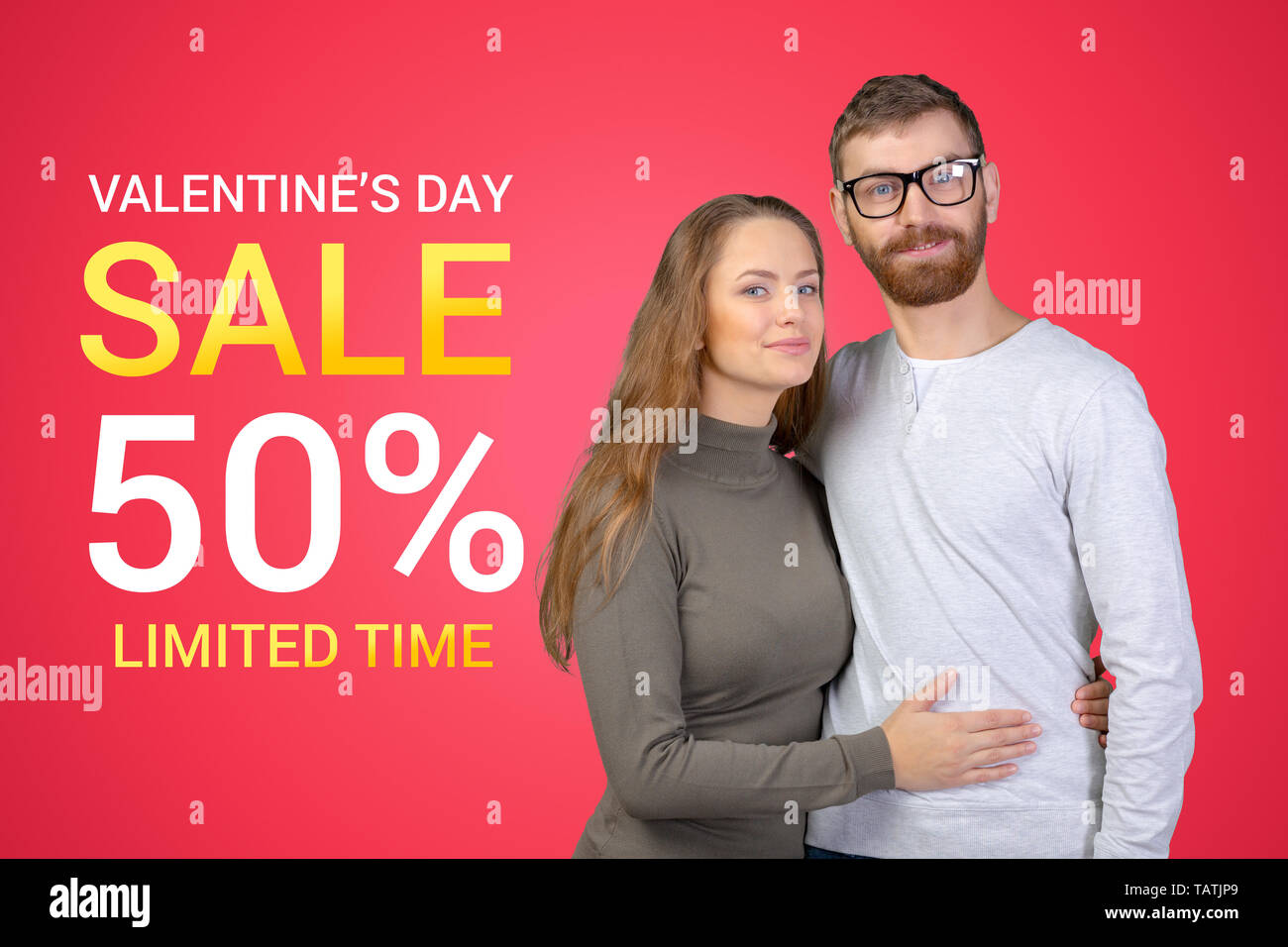 Cheerful young couple standing Stock Photo - Alamy Cheerful young couple standing Stock Photo - Alamy