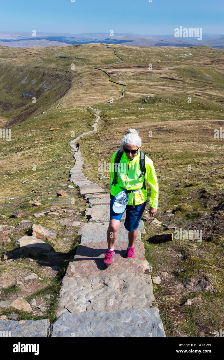 A flagstone path to the summit of Ingleborough in the Yorkshire Dales ...