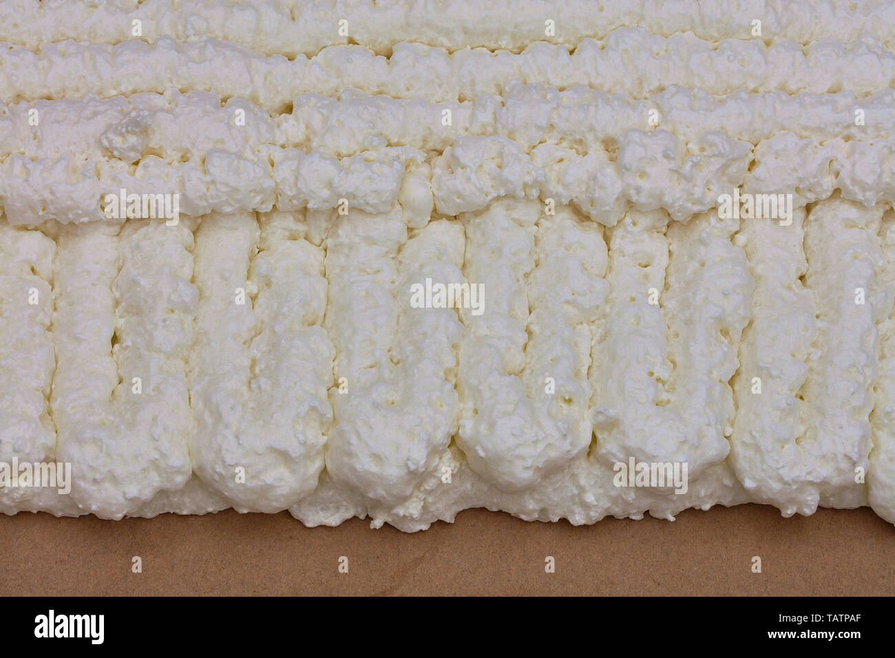 Texture and background of the wall of construction foam laid on a ...
