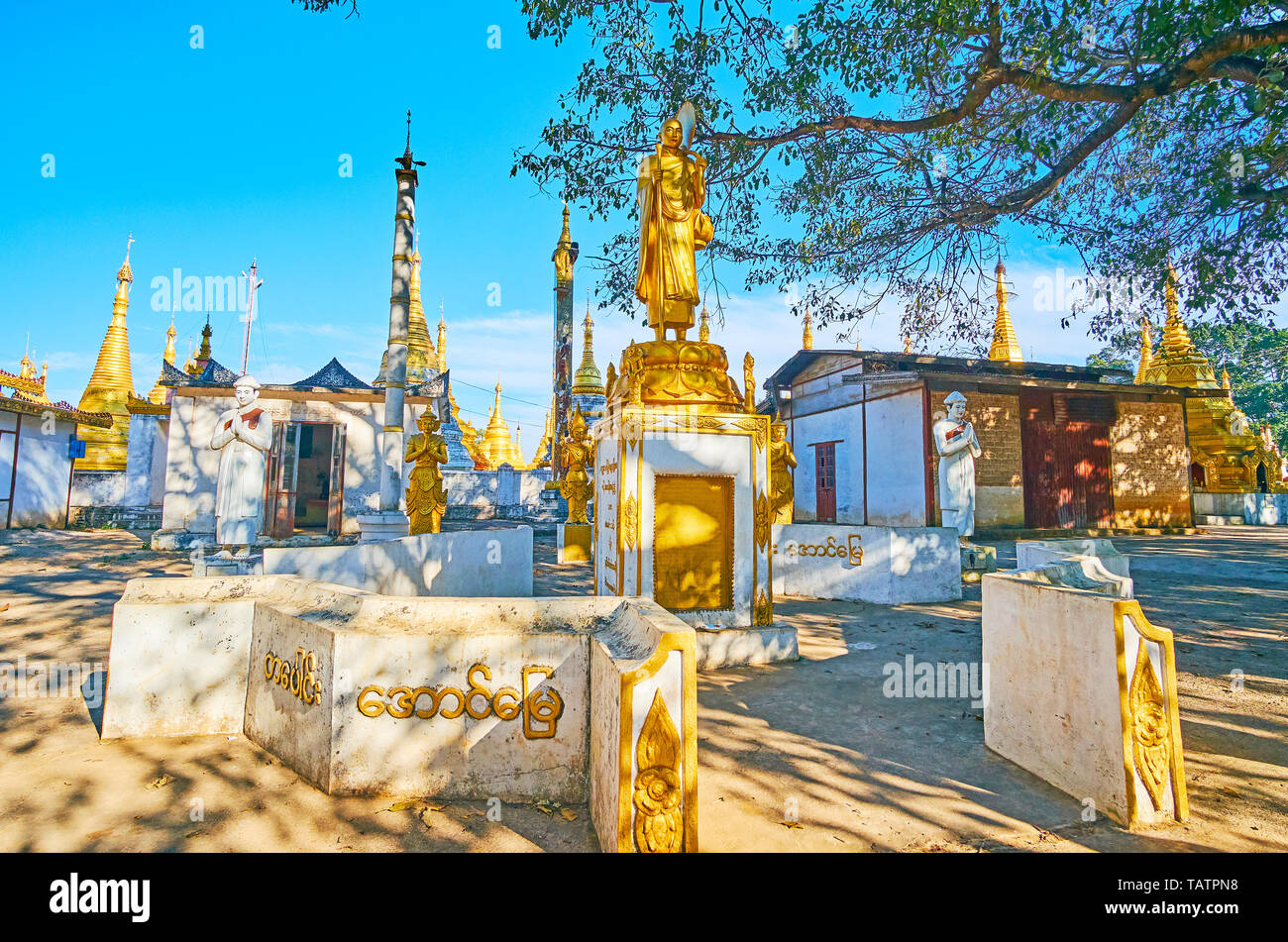 The scenic golden monument to the Buddhist monk (bhikkhu) with a view ...