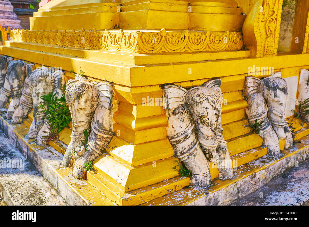 The lower part of the golden pagoda in Nget Pyaw Taw Paya is decorated ...