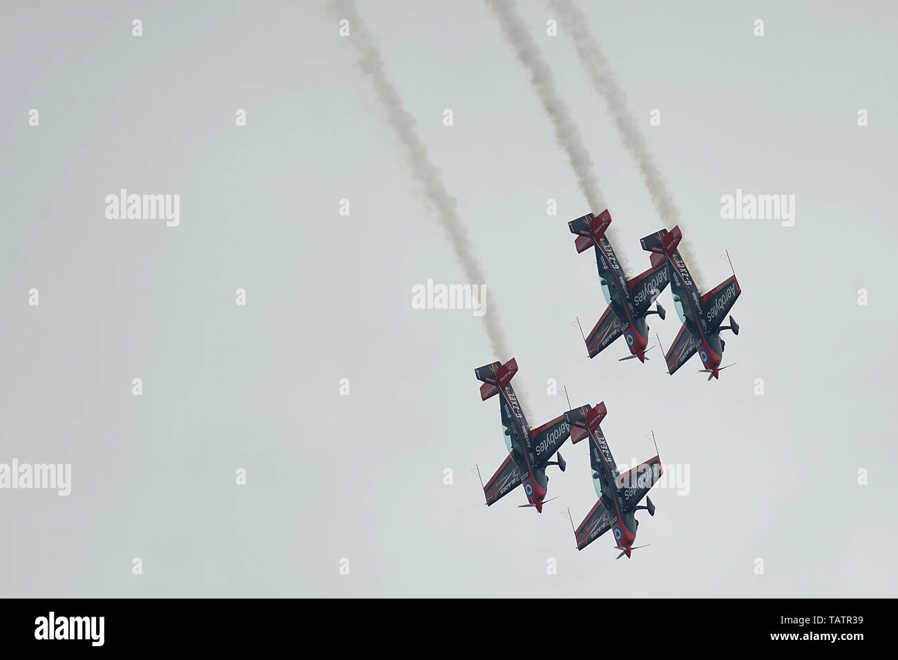 The Blades Aerobatic Team dives in formation during the Duxford Air ...