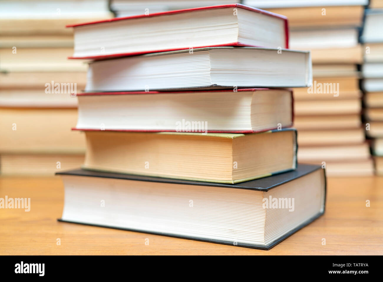 Stack of books in the library. Symbol of knowledge and learning Stock ...