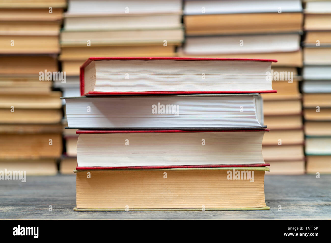 Stack of books in the library. Symbol of knowledge and learning Stock ...