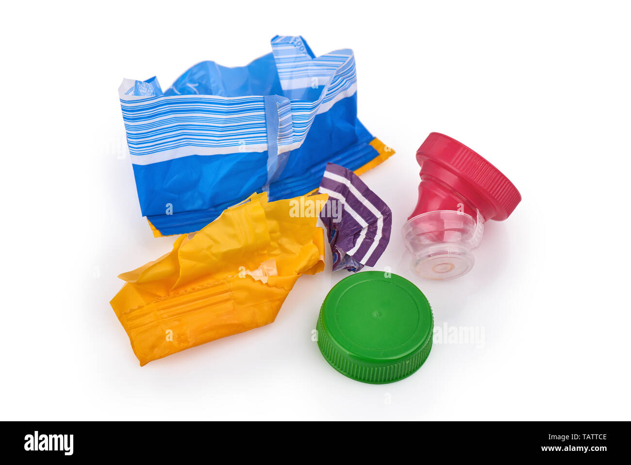 Plastic pollution of food concept - isolated on a white background ...