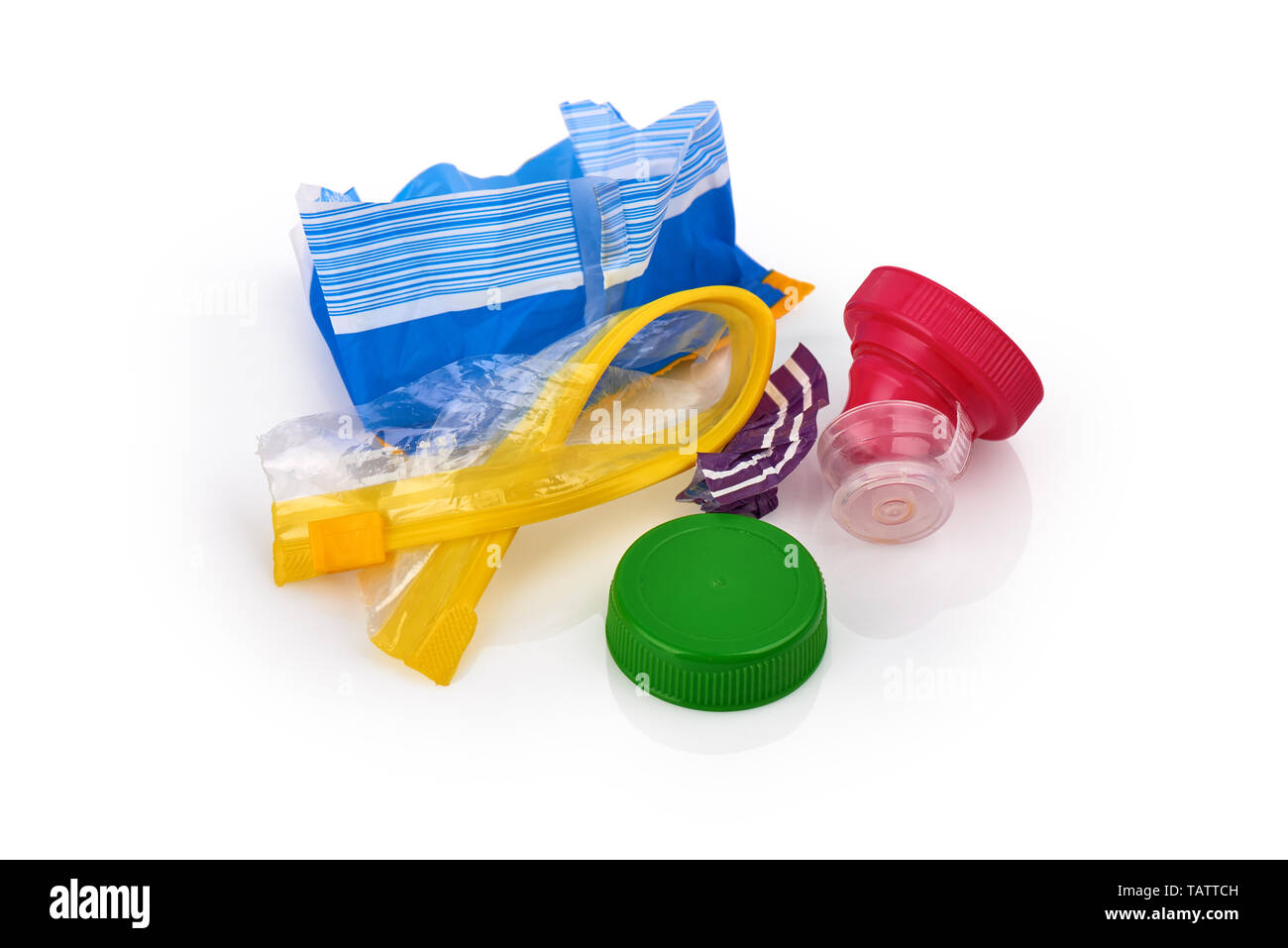 Plastic pollution of food concept - isolated on a white background ...