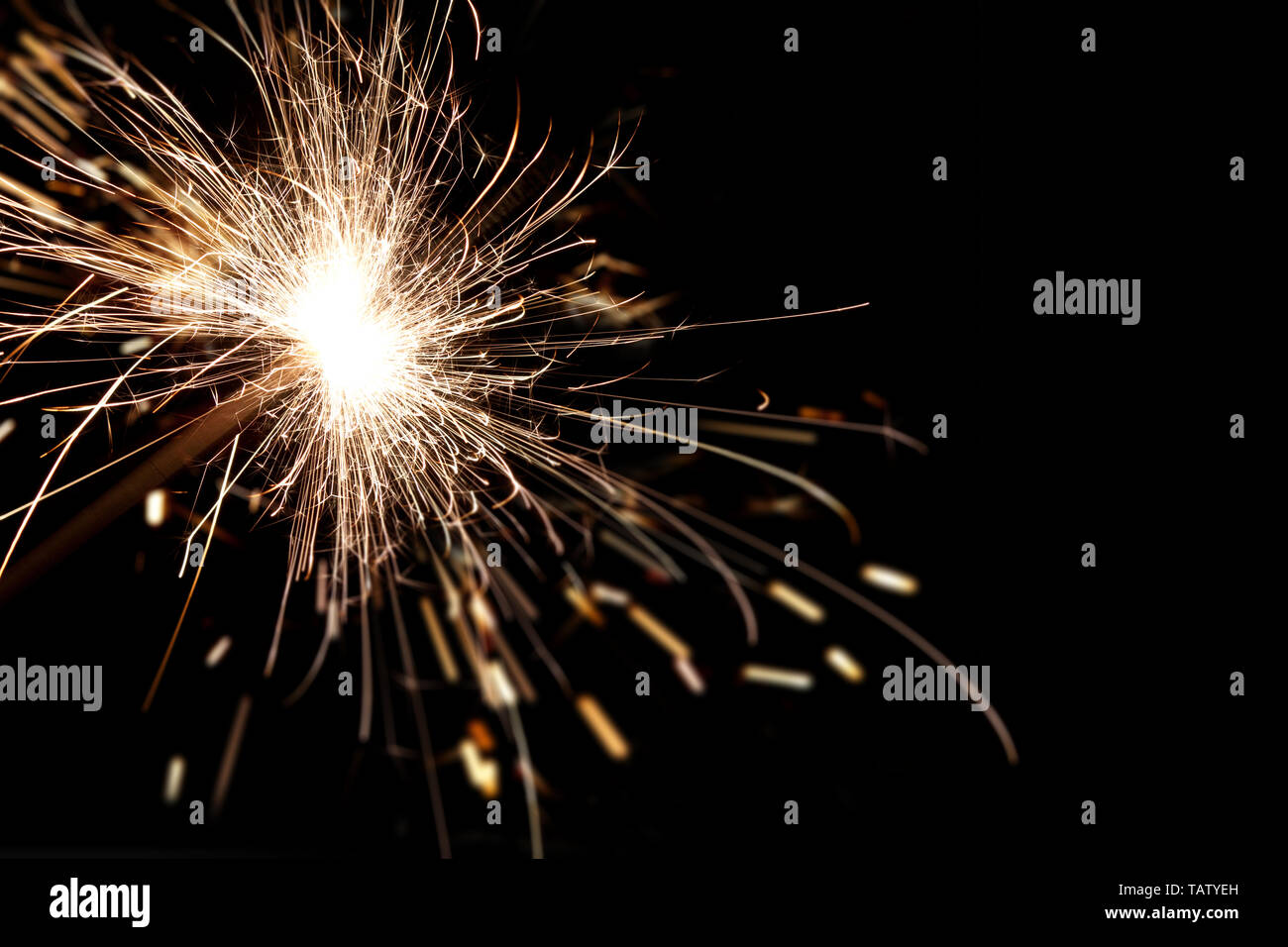 Burning Bengal fire on a black background. Christmas, New Year sparkle ...