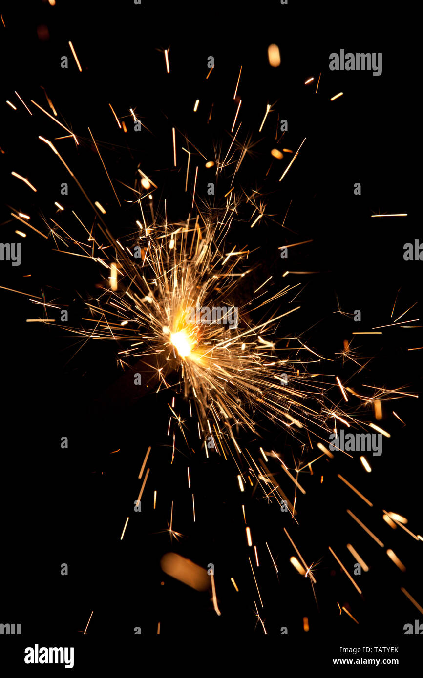 Burning Bengal fire on a black background. Christmas, New Year sparkle ...