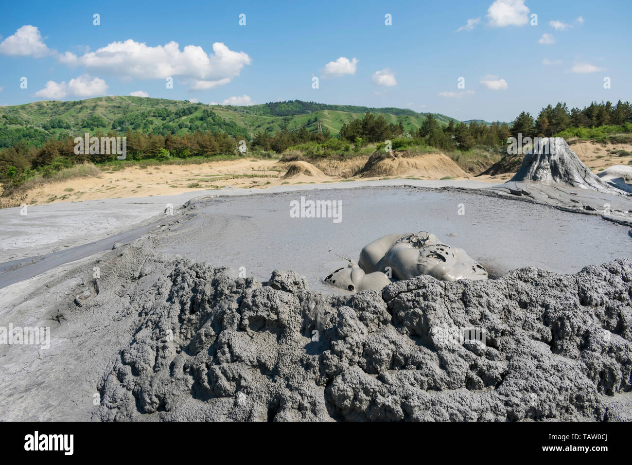The muddy volcanoes from Buzau , Romania are a geological surface ...