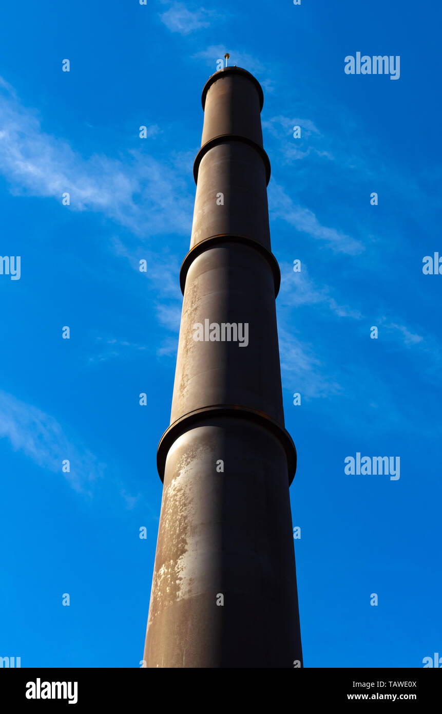 Old steel chimney from an abandoned factory Stock Photo - Alamy