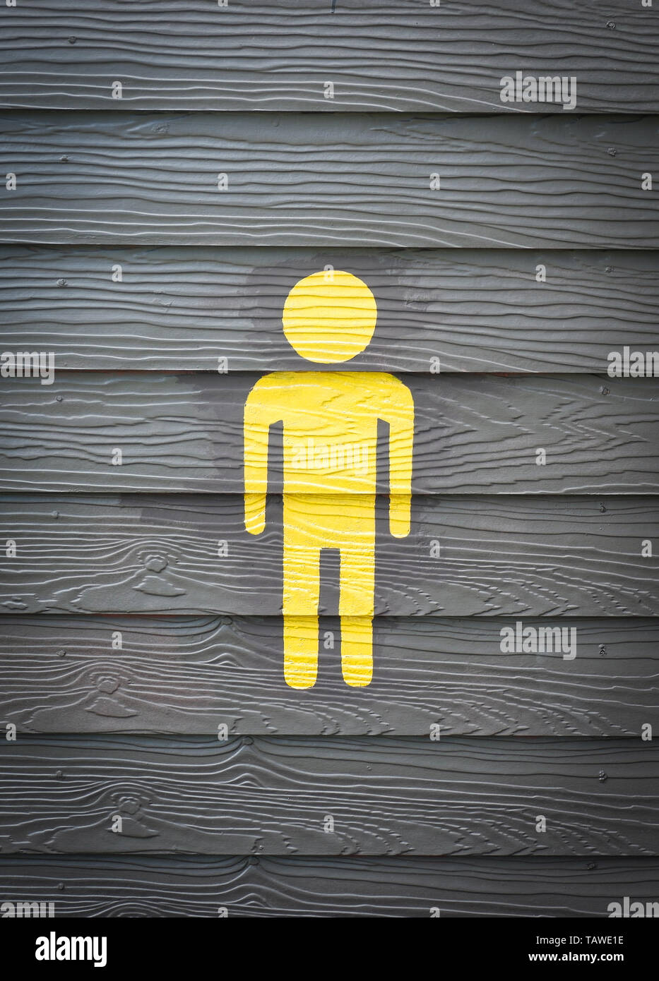 Men Toilet Sign yellow restroom sign on wooden wall door at bathroom ...