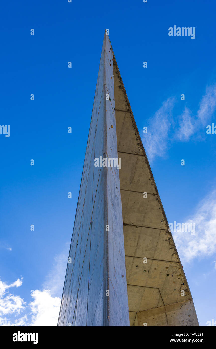 urban-concrete-construction-in-the-form-of-a-prism-with-climbing-wall