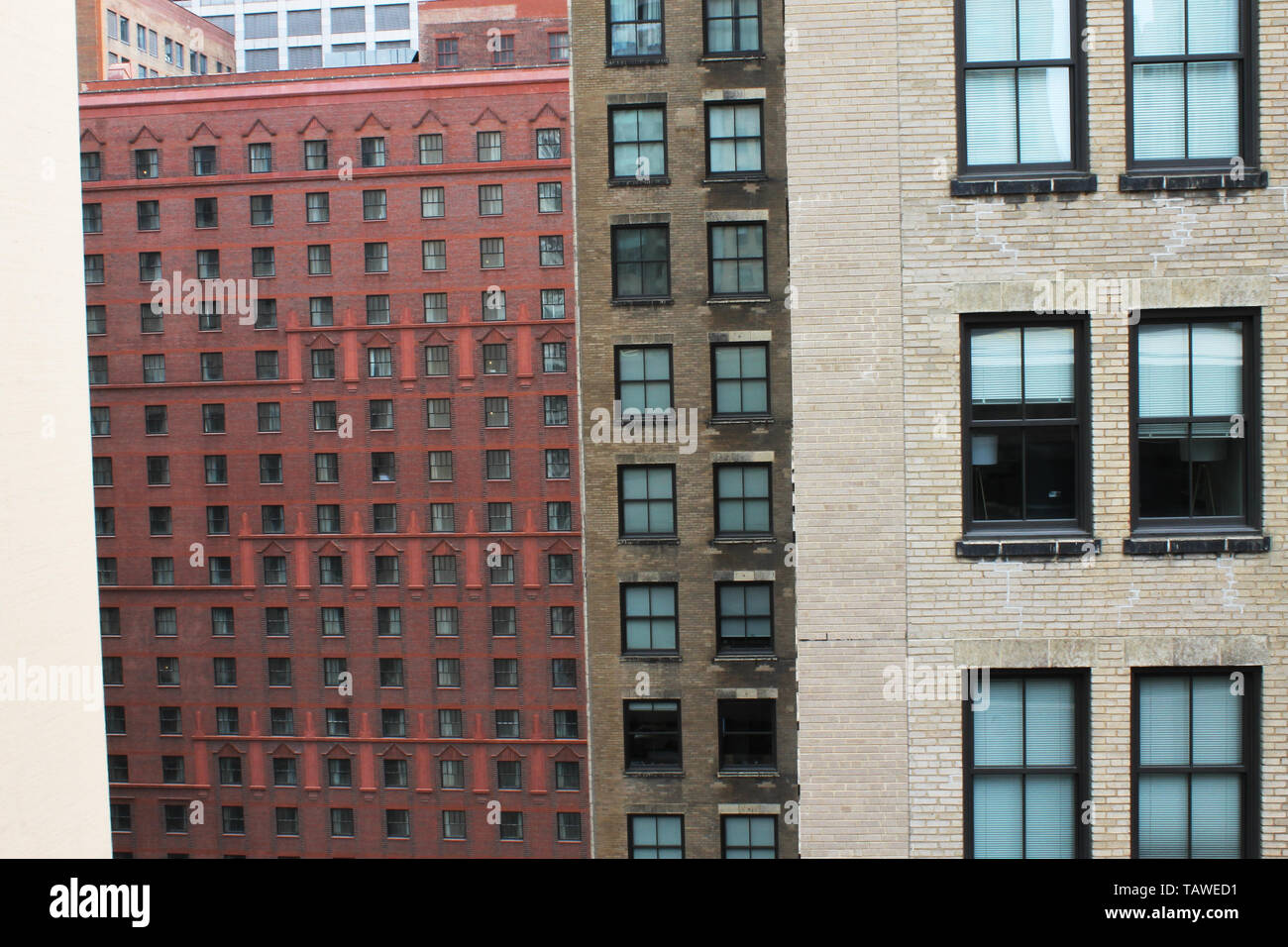Three old brick buildings with lots of windows in downtown, the Loop ...