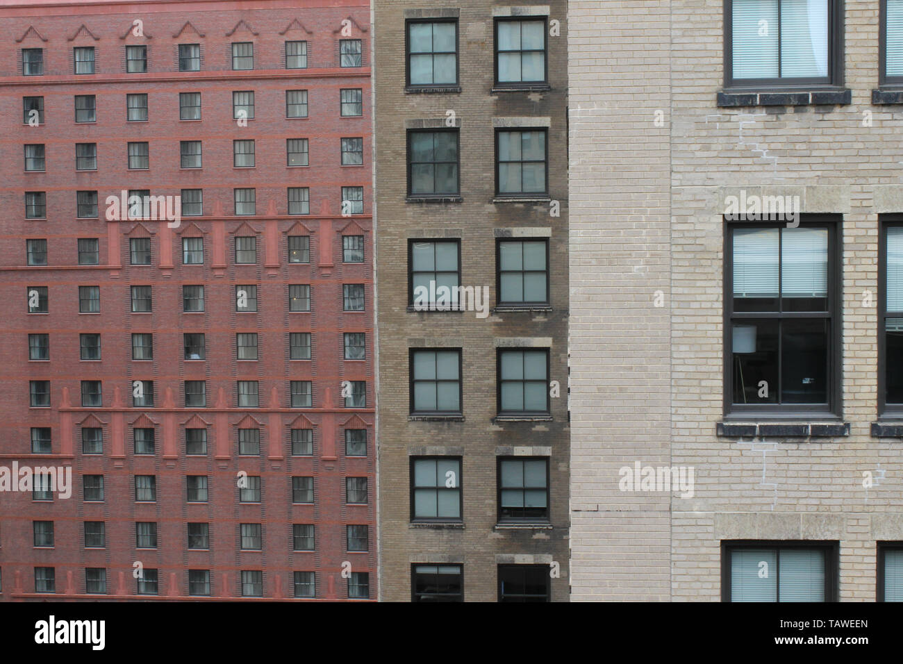 Three old brick buildings with lots of windows in downtown, the Loop ...
