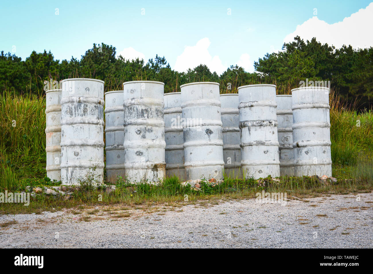 Storage water tank concrete cement on hill and meadow background Stock ...