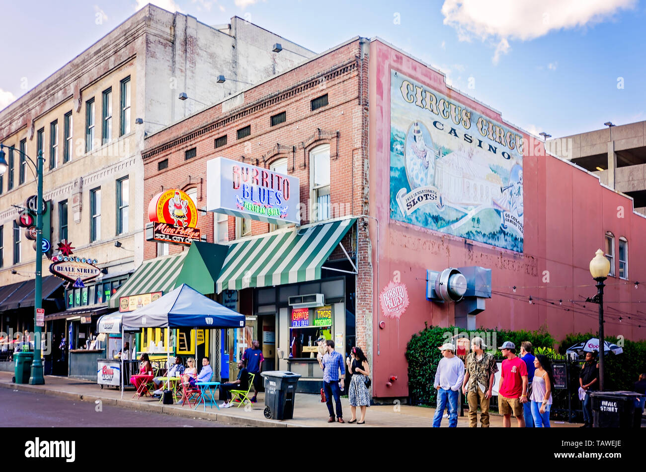 Tourists explore Beale Street, Sept. 12, 2015, in Memphis, Tennessee ...