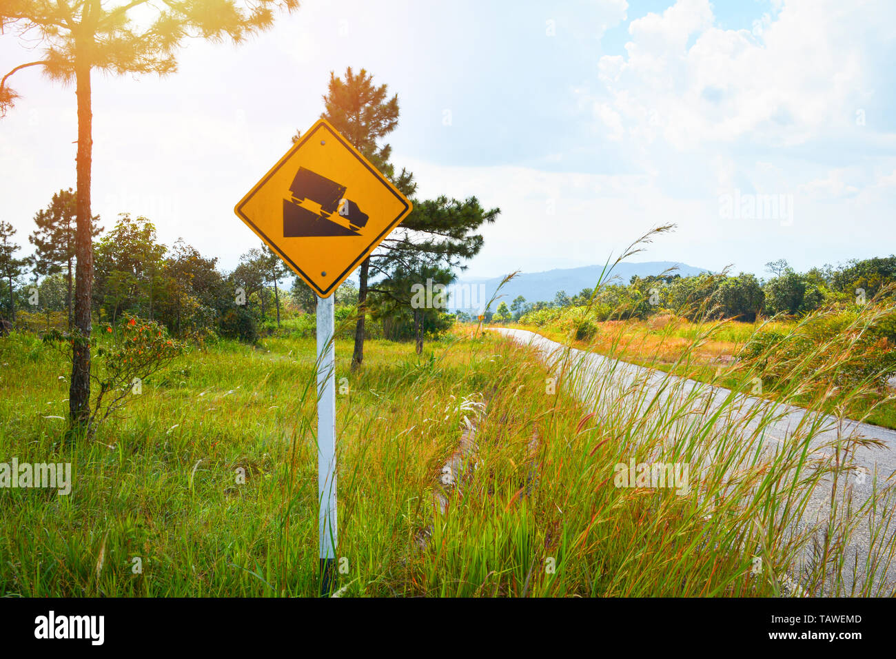 Road sign Steep Slope warning traffic and truck on hill mountain Stock ...
