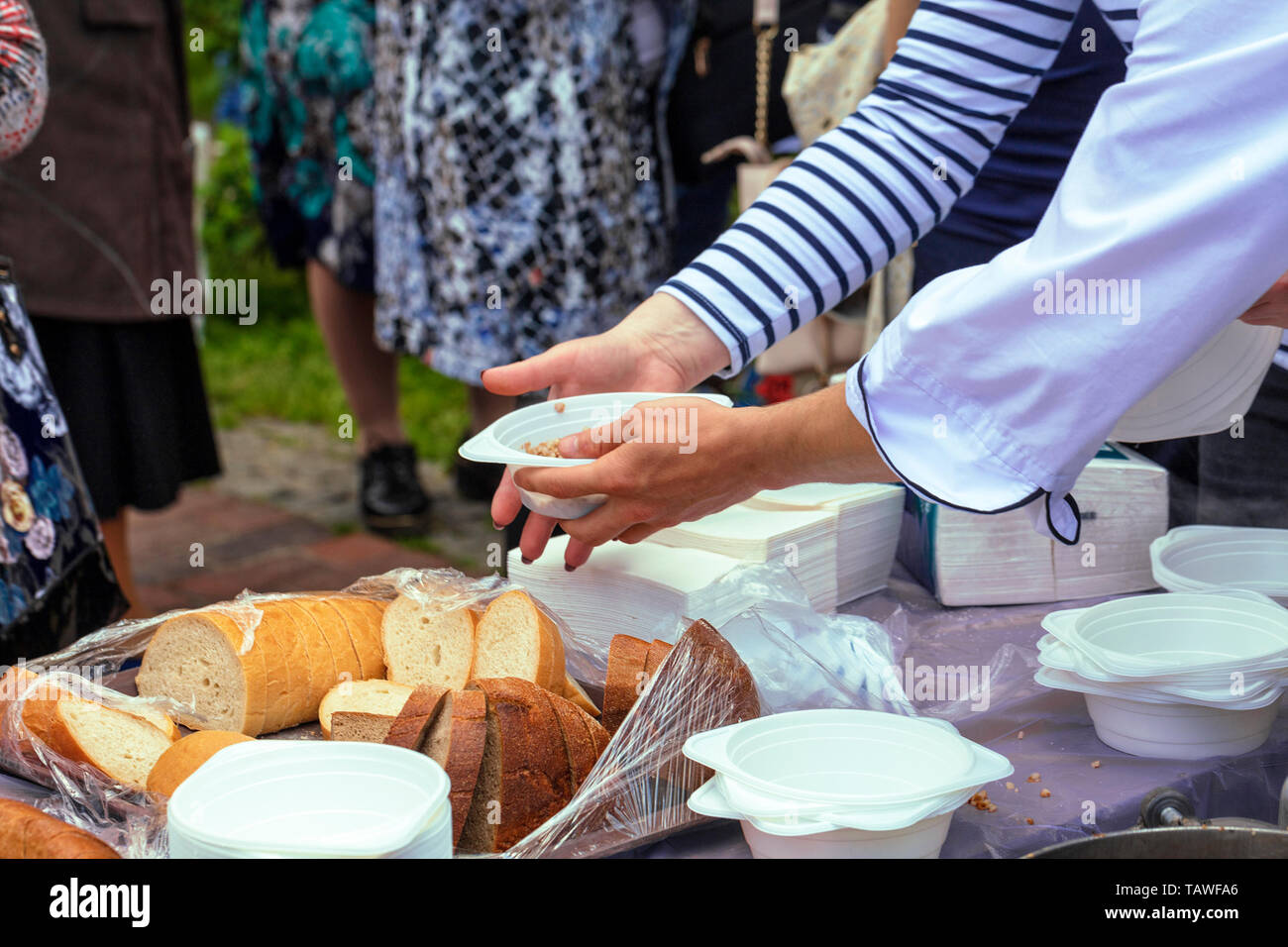 The concept of caring for the poor and the elderly: social workers feed ...