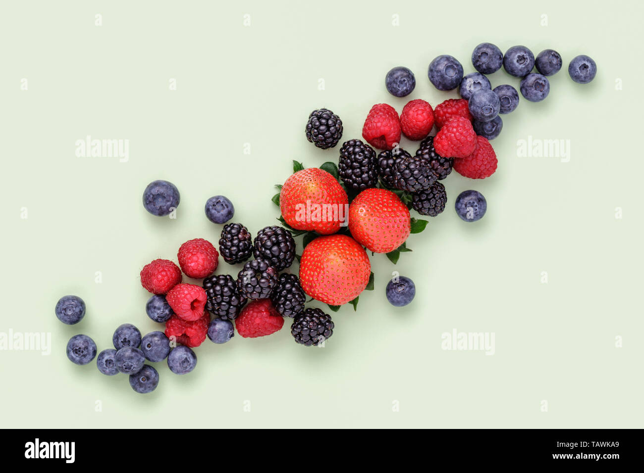 Strawberries blueberries on plain hi-res stock photography and images ...