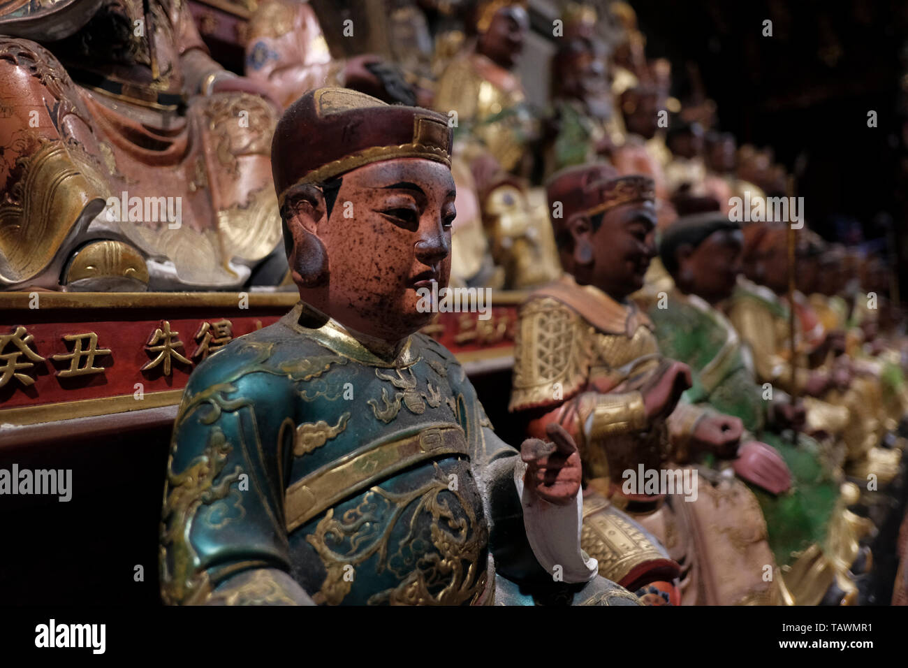 Sculpted figures at an altar inside the Taoist Zushi Temple located ...