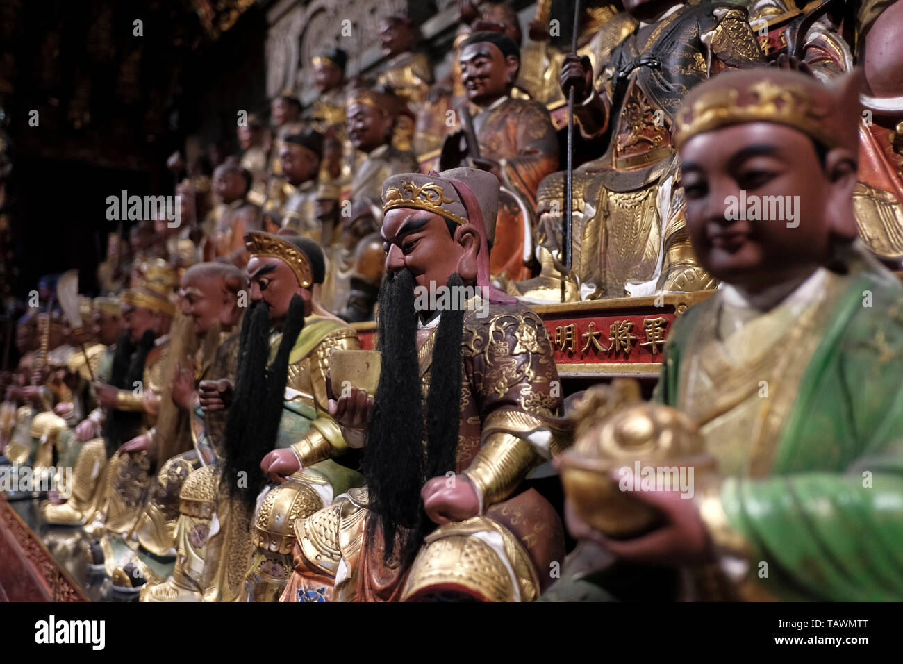 Sculpted figures at an altar inside the Taoist Zushi Temple located ...