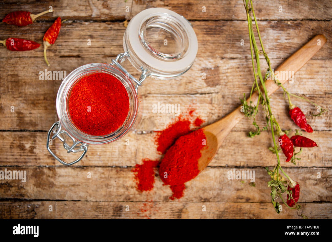 Grounded red pepper in a bowl top view Stock Photo - Alamy