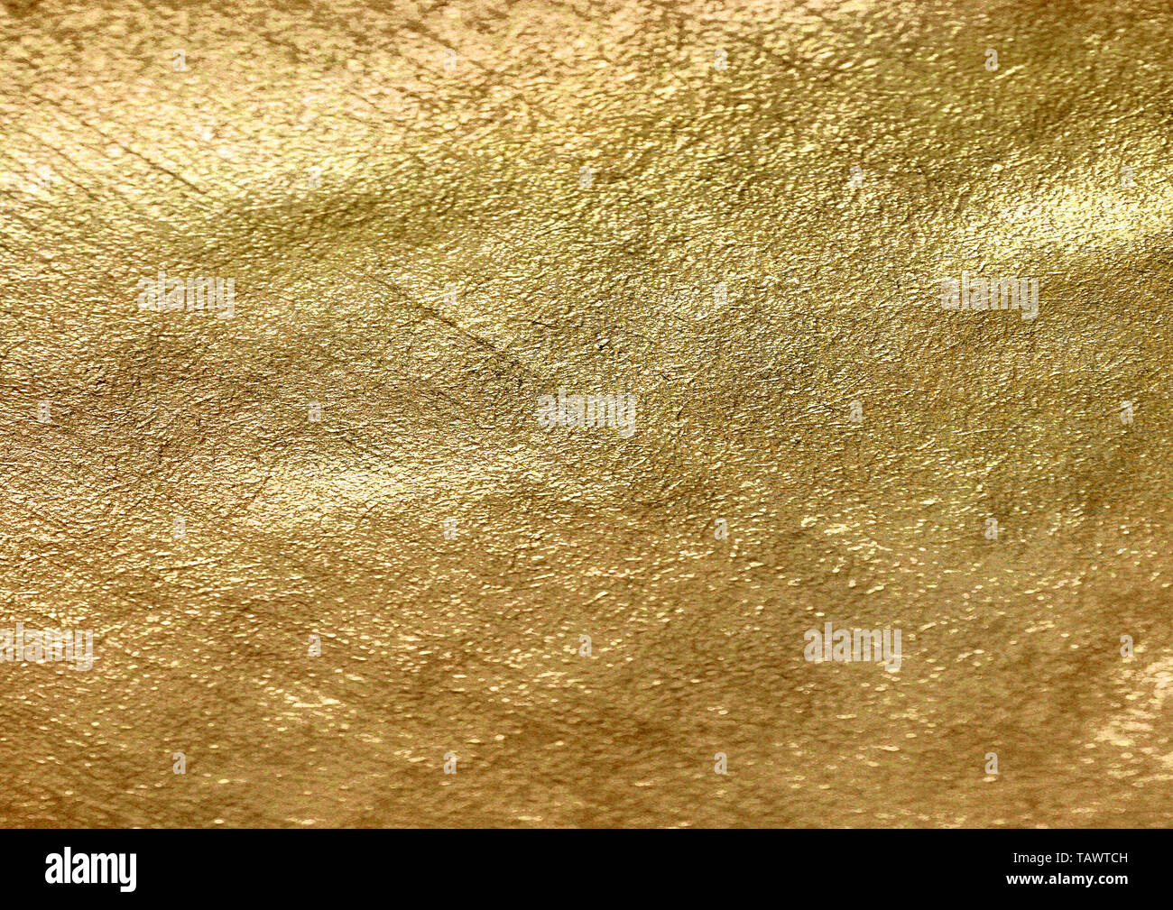 The golden blank overlay textured metallic paper background with ...