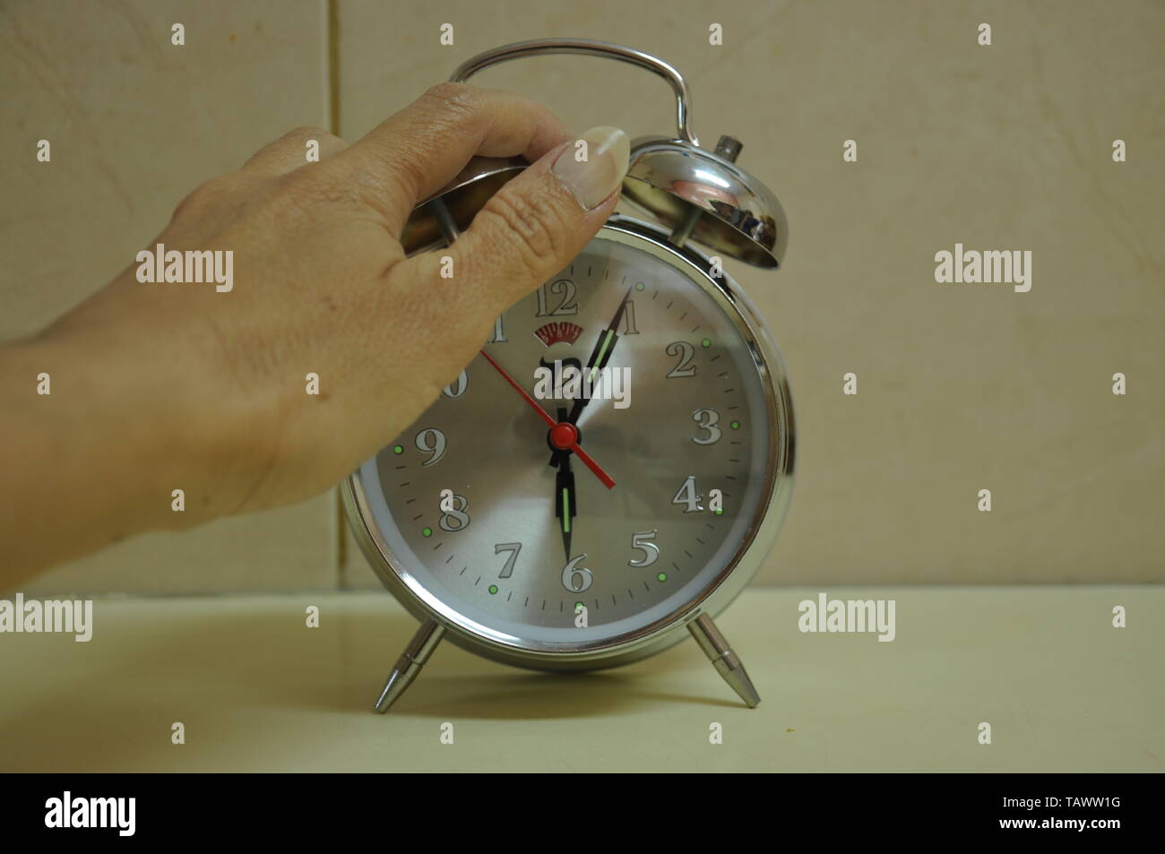 Clock turns hi-res stock photography and images - Alamy