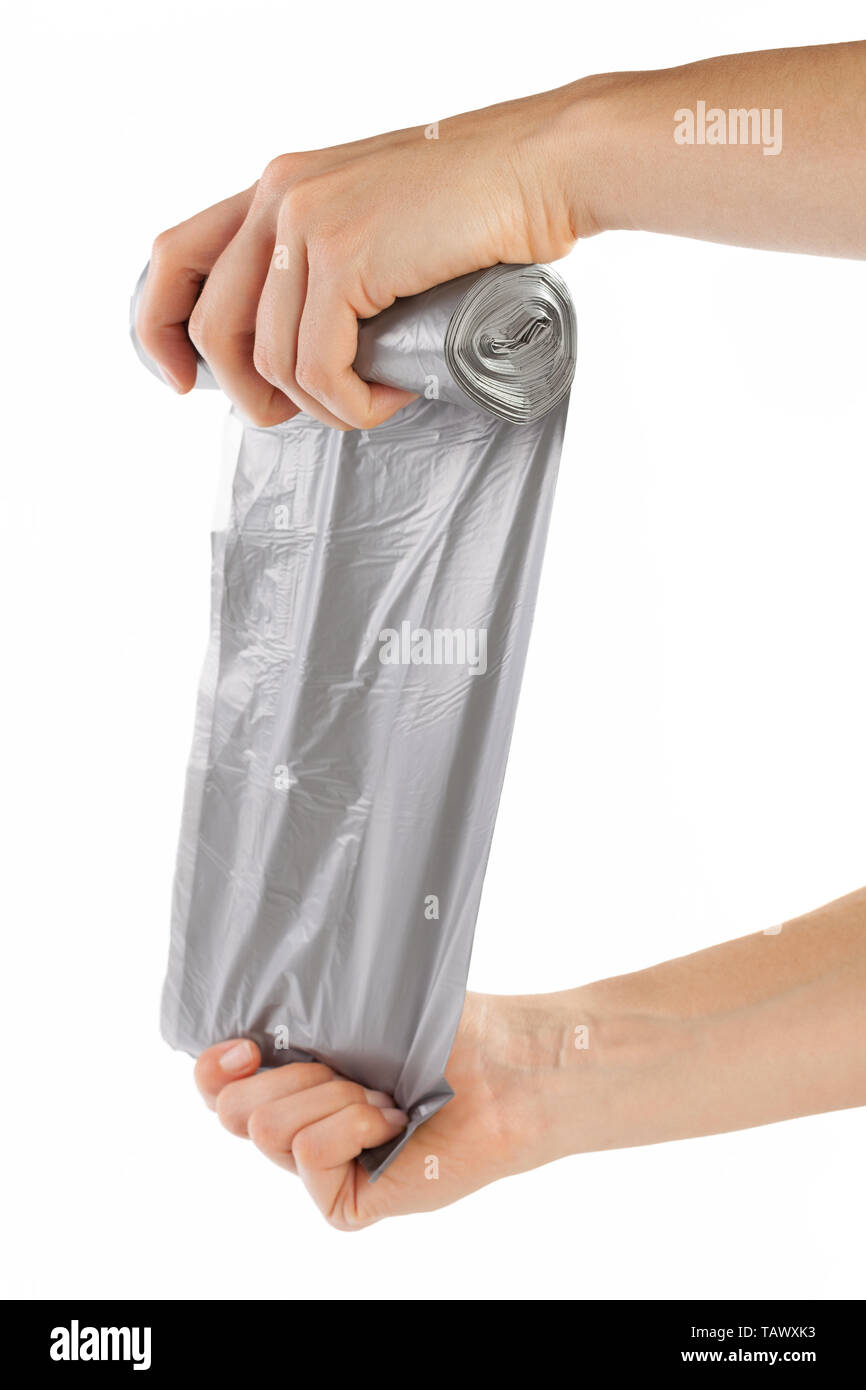 woman hands holding garbage bag isolated on white background Stock ...