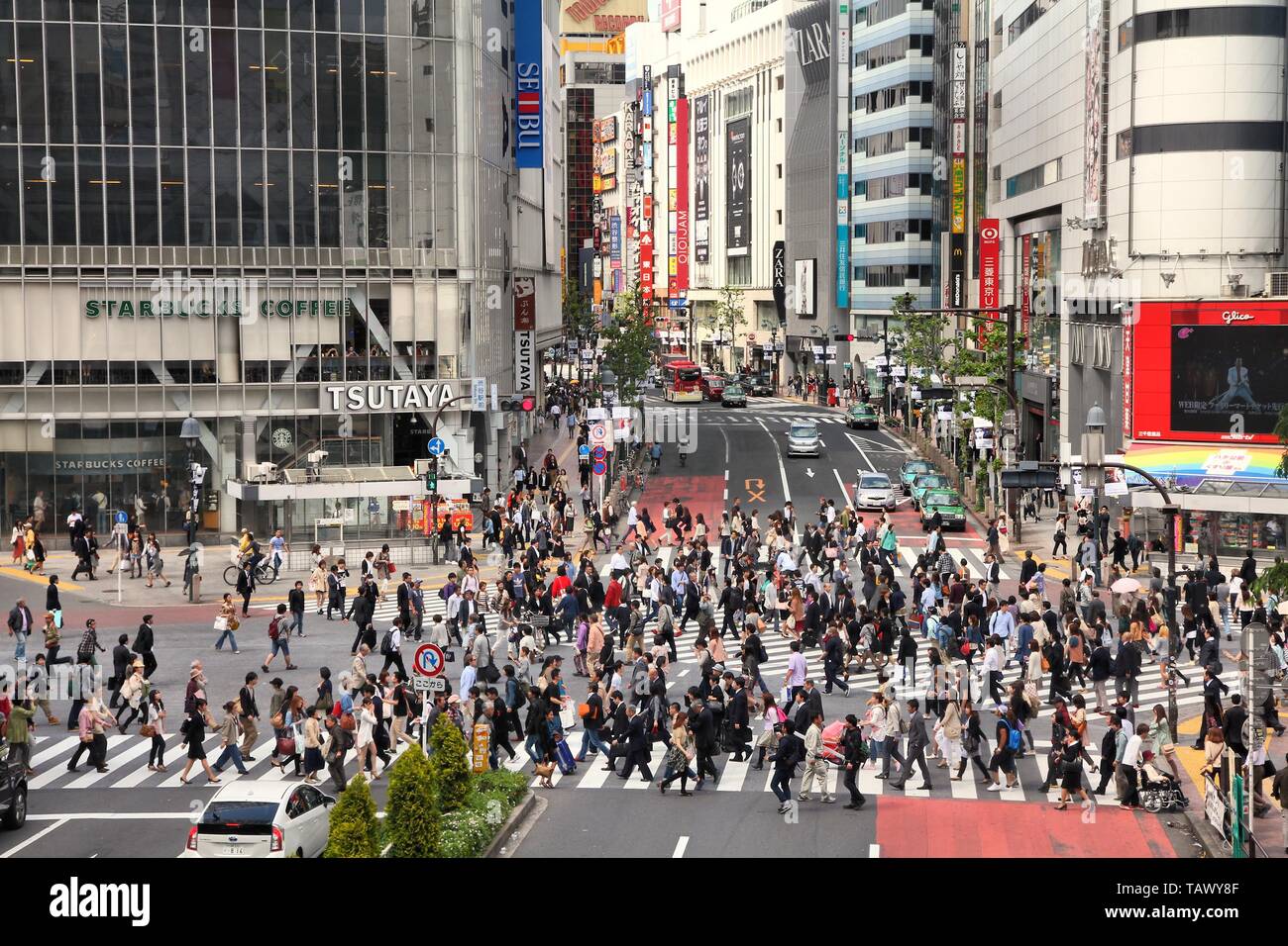 TOKYO, JAPAN - MAY 11, 2012: People walk the Hachiko crossing in ...