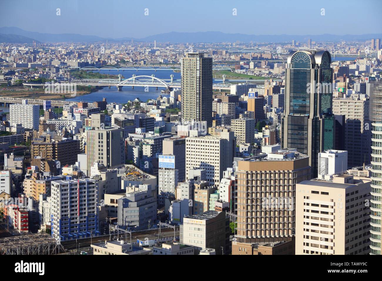 OSAKA, JAPAN - APRIL 27, 2012: Cityscape view in Osaka, Japan. Osaka is ...