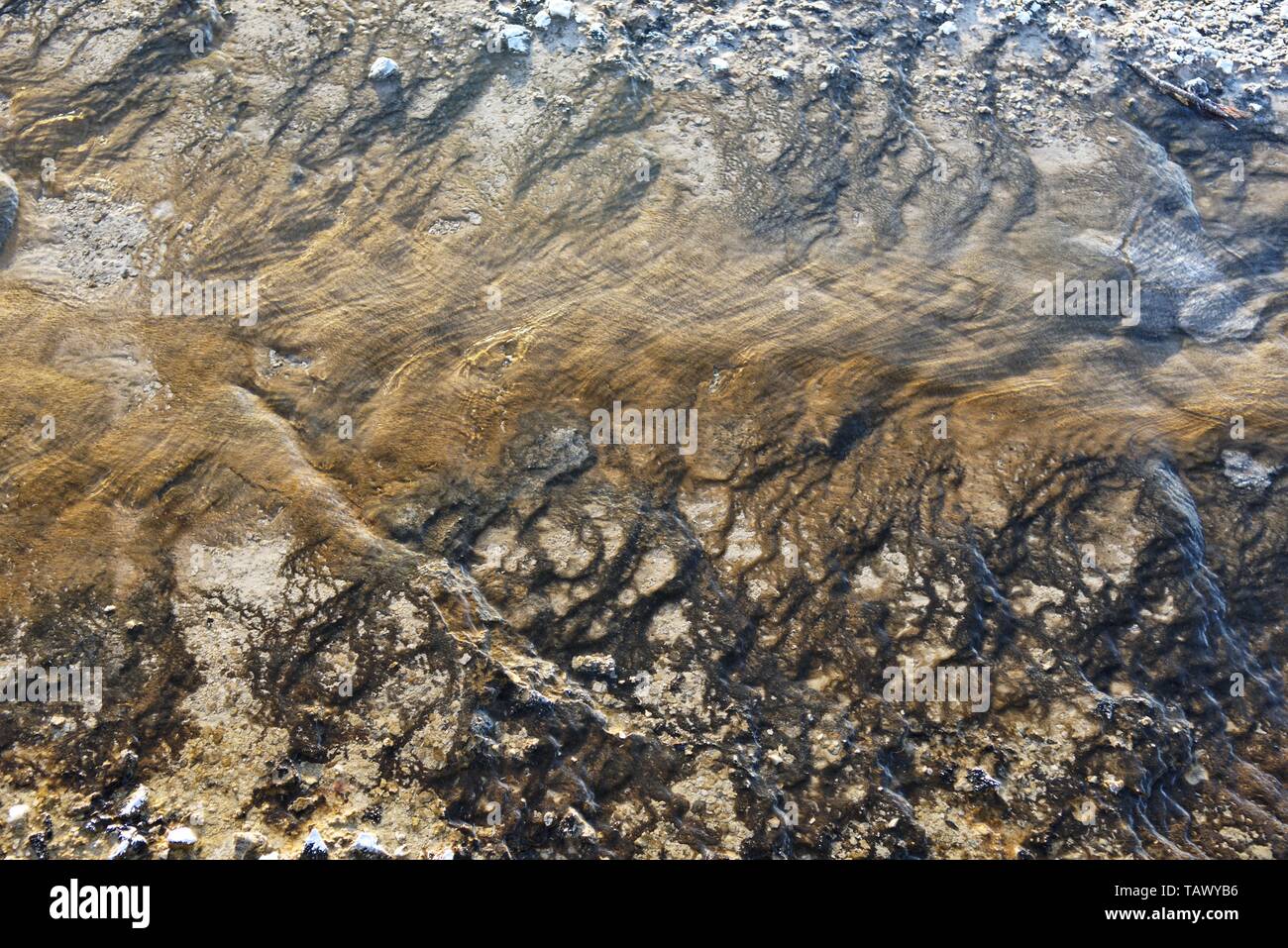 Volcanic stream bottom Stock Photo - Alamy