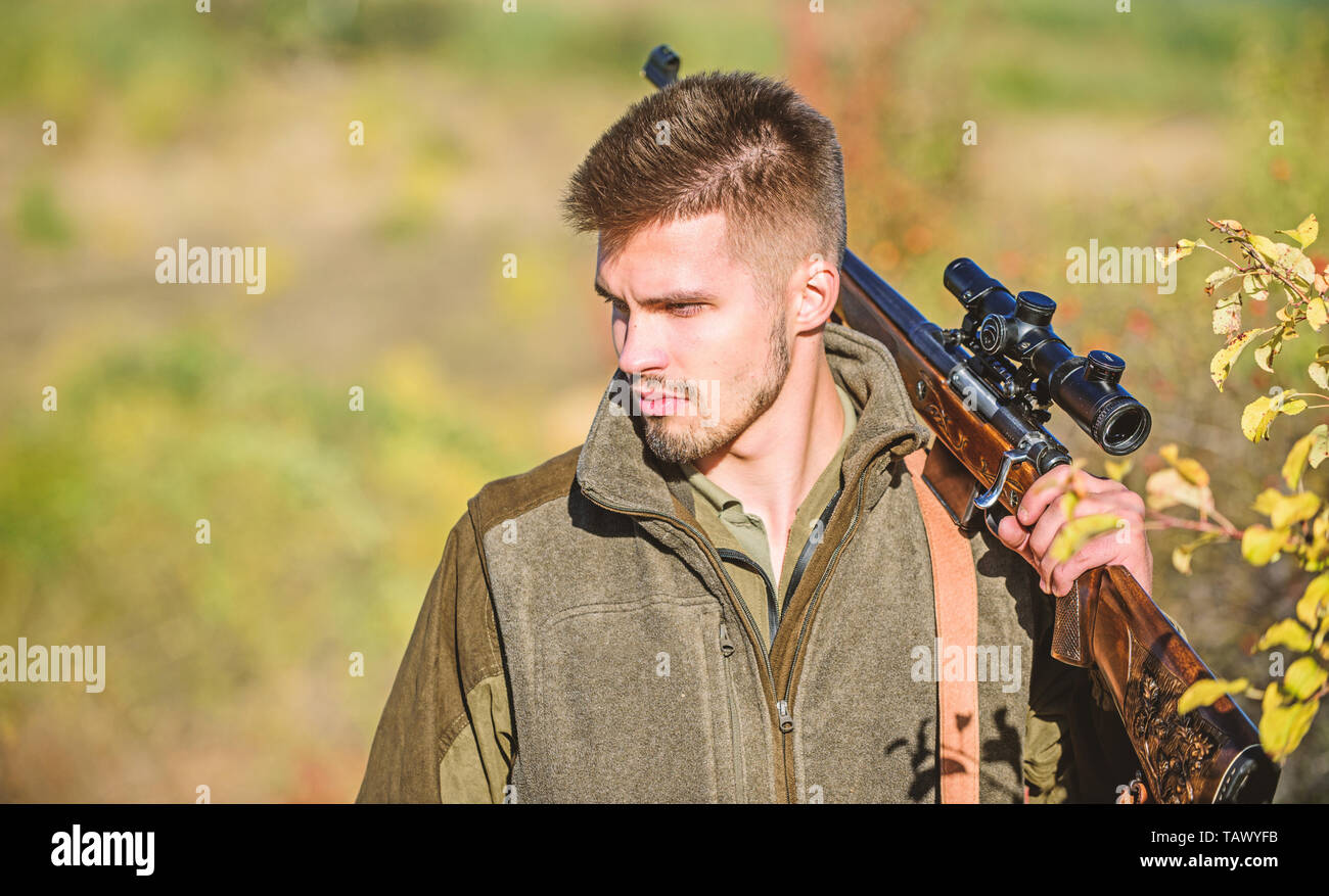 Man hunter with rifle gun. Boot camp. Hunting skills and weapon ...