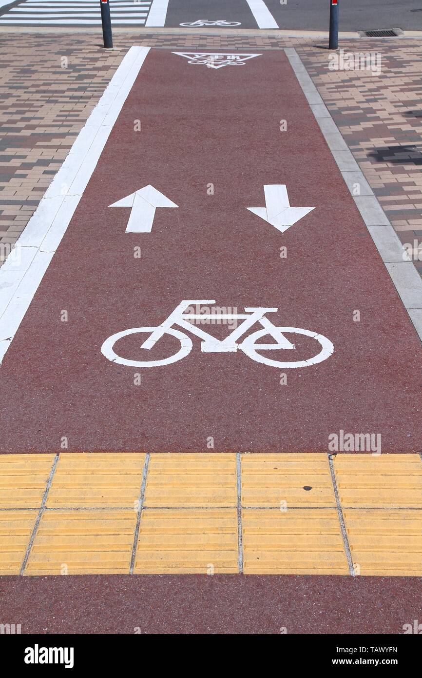 Cycling path in the city in Japan. Bike lane Stock Photo - Alamy