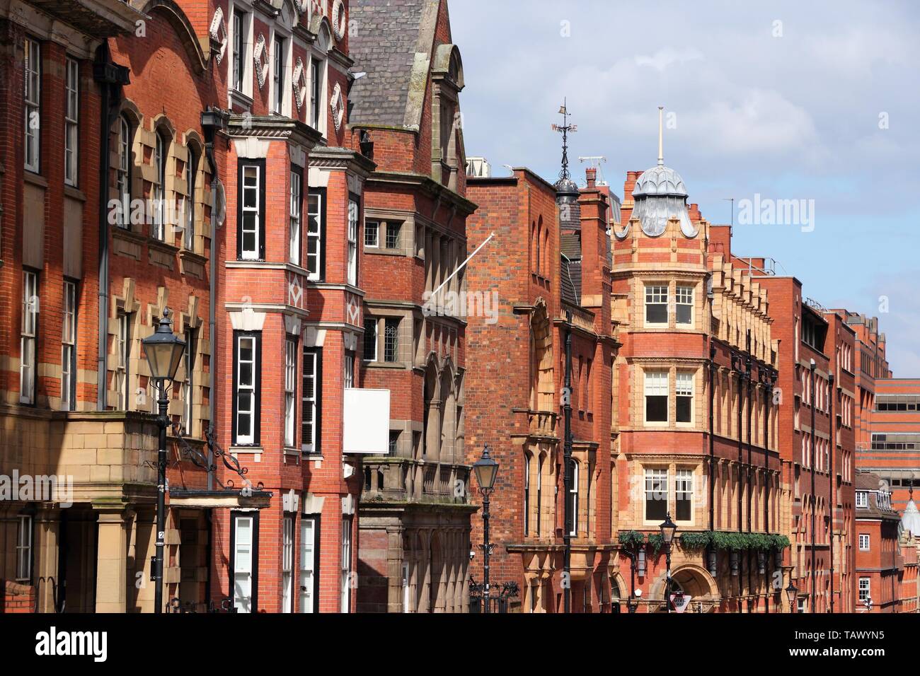 Birmingham, UK - street view with old brick townhouse architecture ...