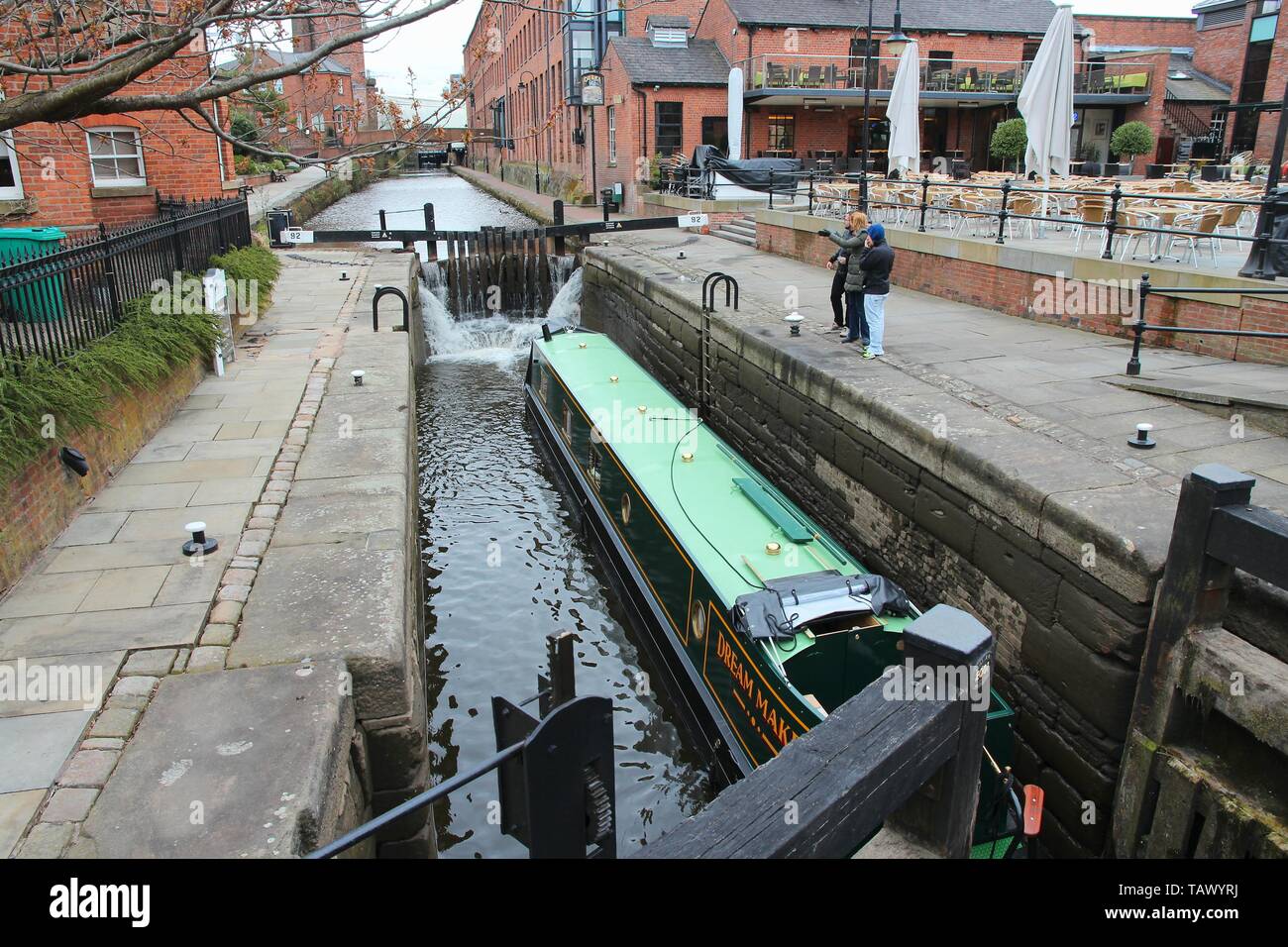 MANCHESTER, UK - APRIL 21, 2013: People visit Castlefield canal area in ...